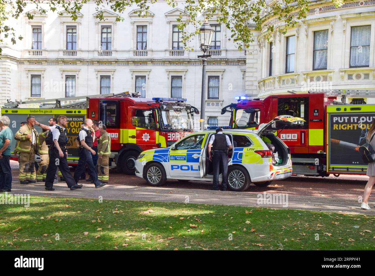 Police putting out fire burning hi-res stock photography and images - Alamy