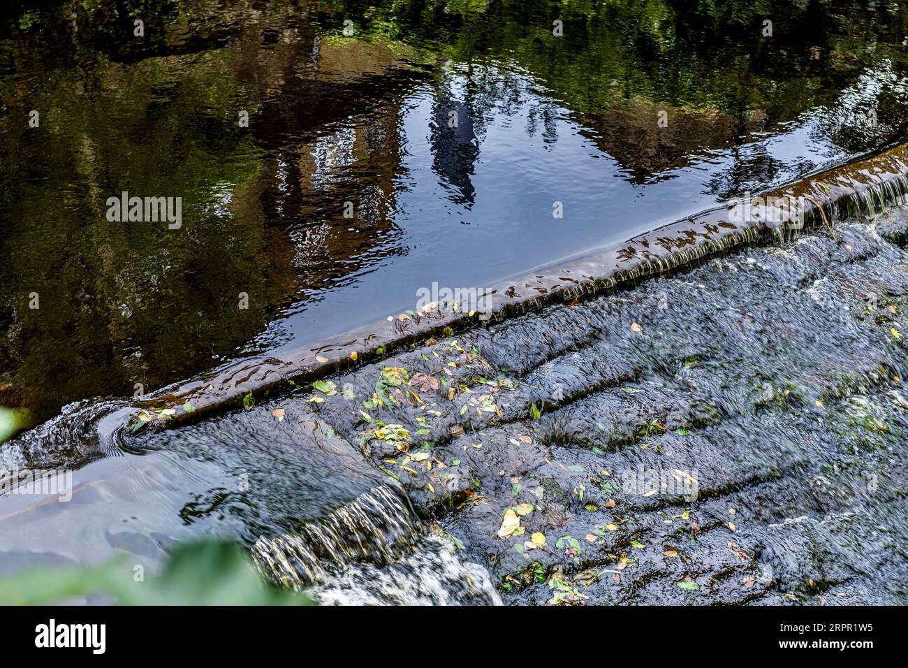 The weir on the River Calder at Hebden Bridge, West Yorkshire. The ...