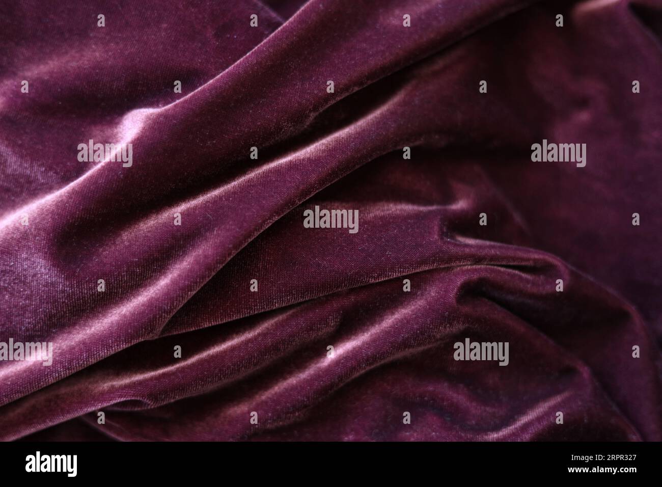 burgundy colored velvet fabric texture Stock Photo - Alamy