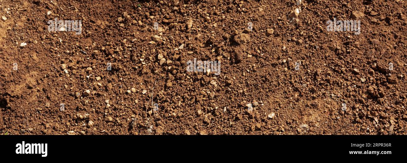 Red soil background, natural rocky ground Stock Photo - Alamy