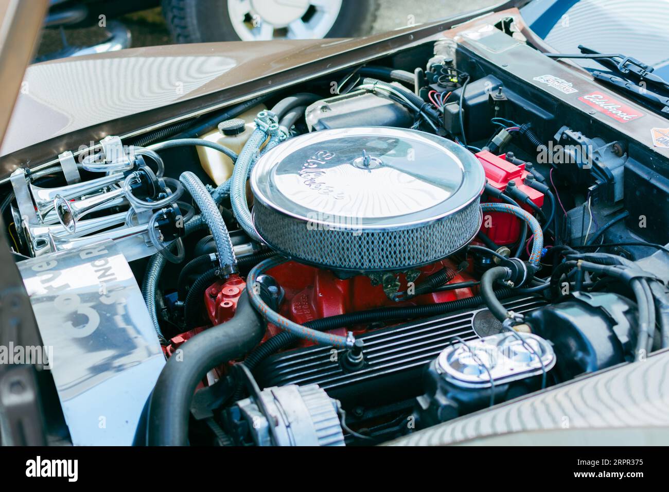 A close up shot of a compact internal combustion engine, mounted inside ...