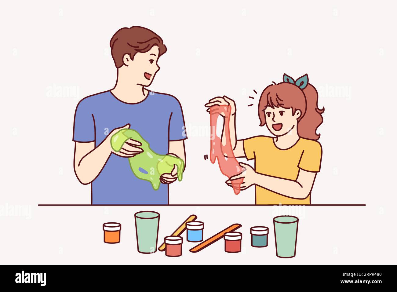 Father and daughter conduct chemical experiments holding and playing ...