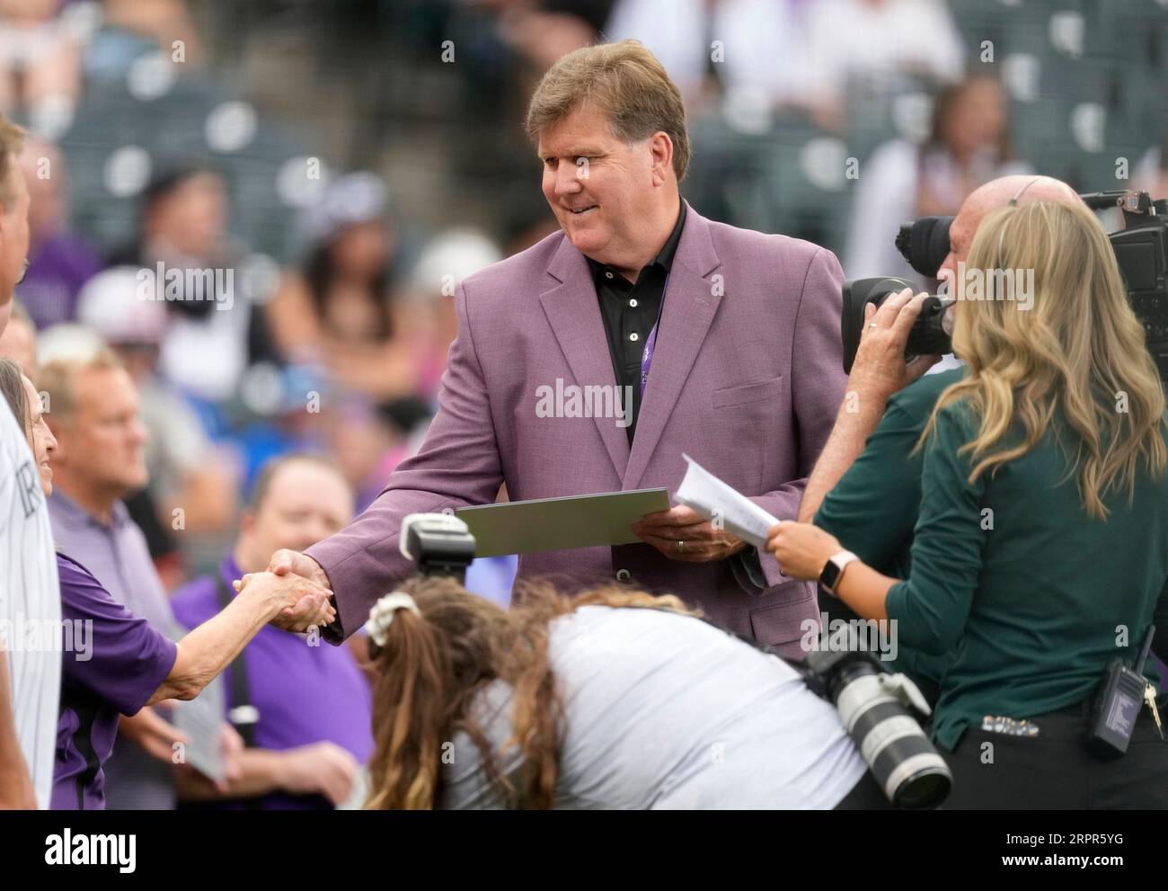 Colorado Rockies president Greg Feasel in the first inning of a ...