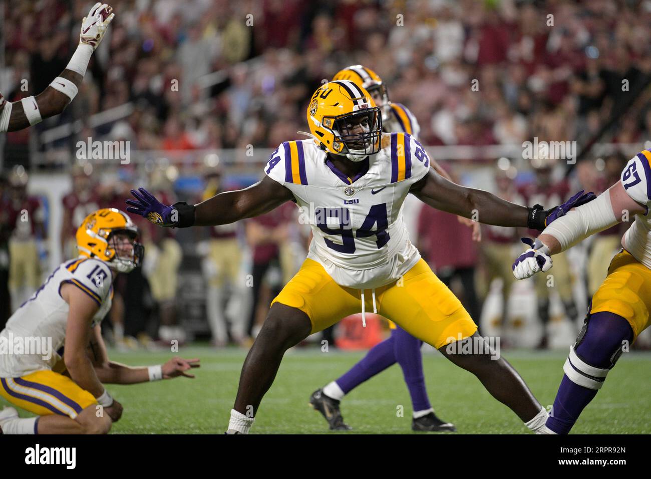 LSU defensive end Paris Shand (94) watches the flight of the ball on an ...