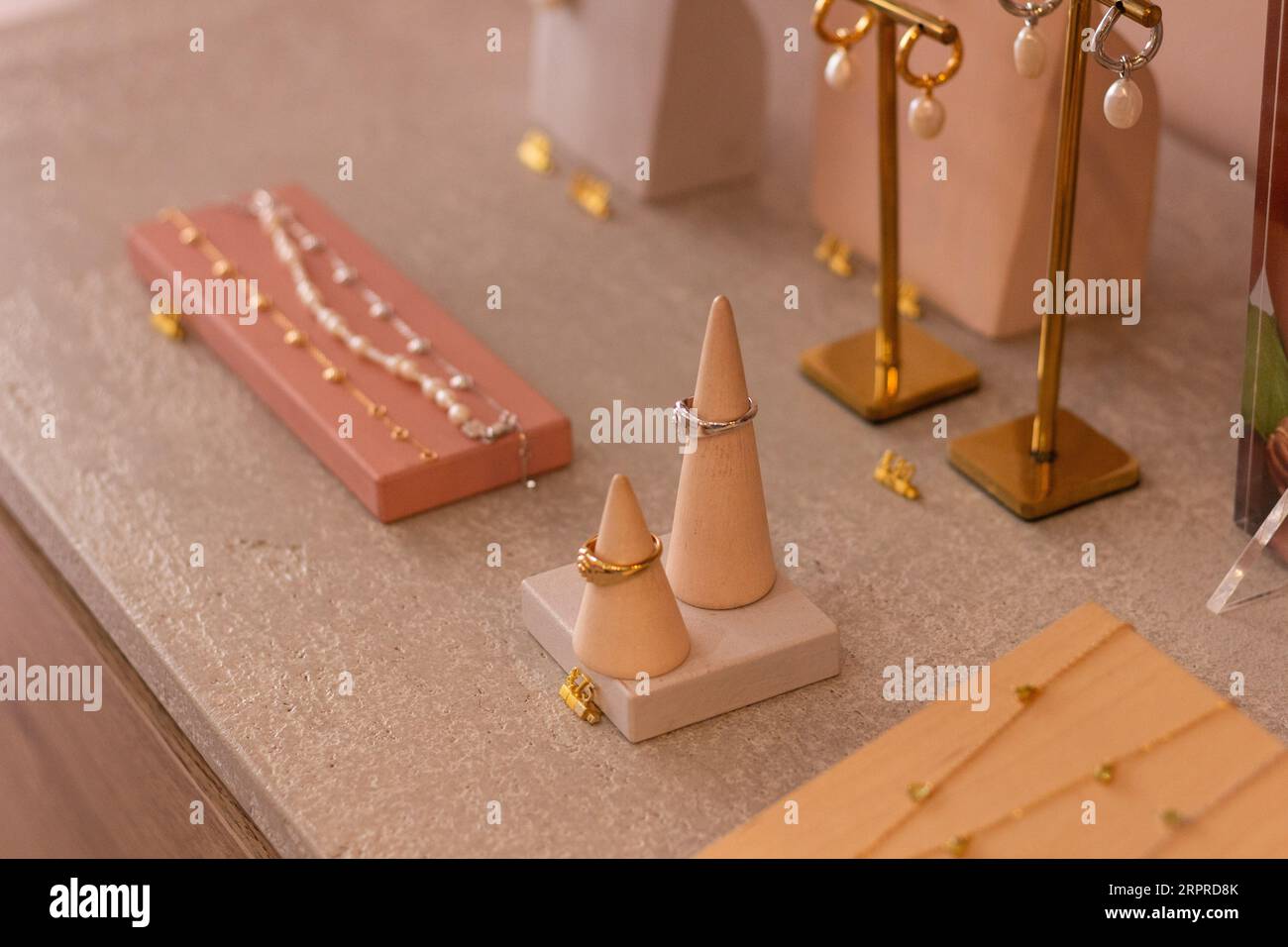 Jewelry Display in store gold and silver Stock Photo - Alamy
