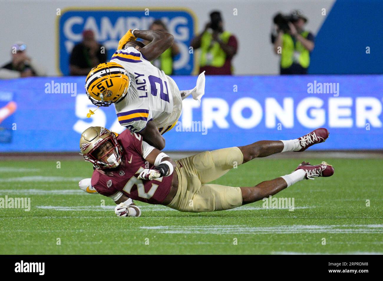 LSU wide receiver Kyren Lacy (2) is tackled by Florida State defensive ...
