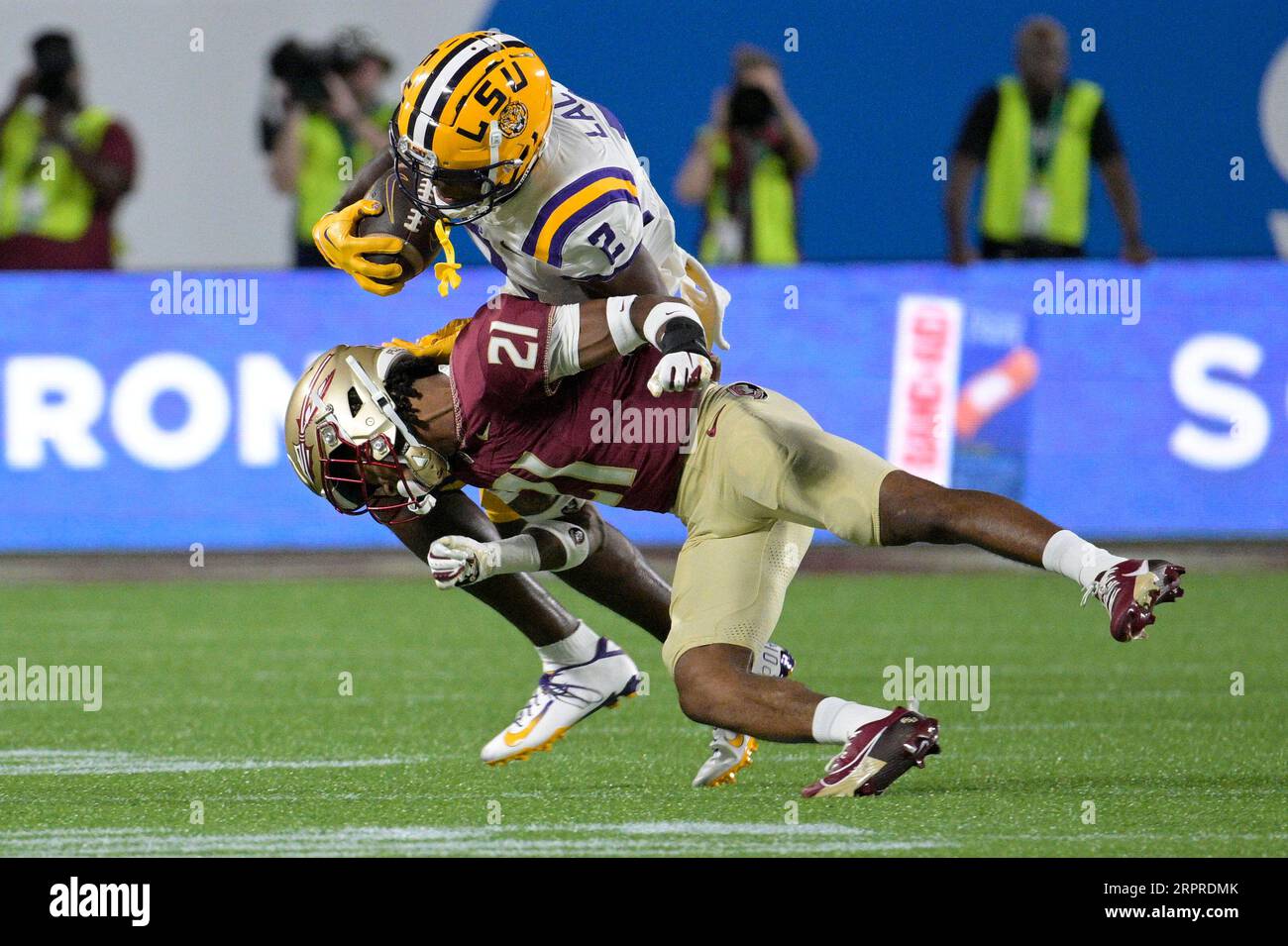LSU wide receiver Kyren Lacy (2) is tackled by Florida State defensive ...