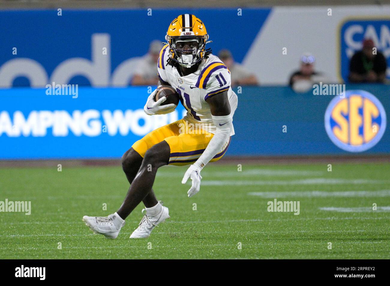 LSU wide receiver Brian Thomas Jr. (11) runs after catching a pass ...