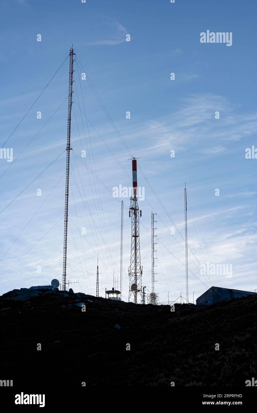 Soft backlit red and white old communication center from the top of a ...