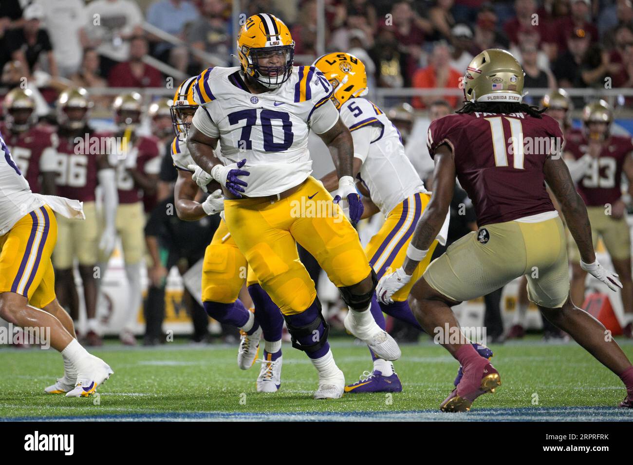 LSU offensive lineman Miles Frazier (70) sets up to block in front of Florida State defensive ...