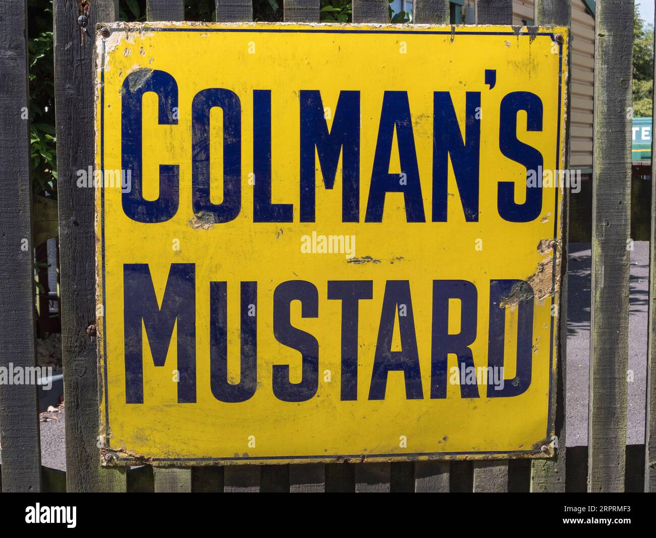 Ceramic sign for Colman's Mustard on fencing outside Horstead Keynes ...