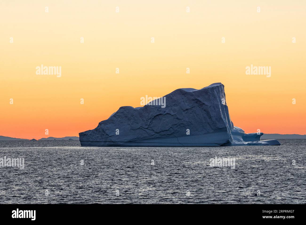 Impressive floating iceberg in Disko Bay in the arctic early morning ...