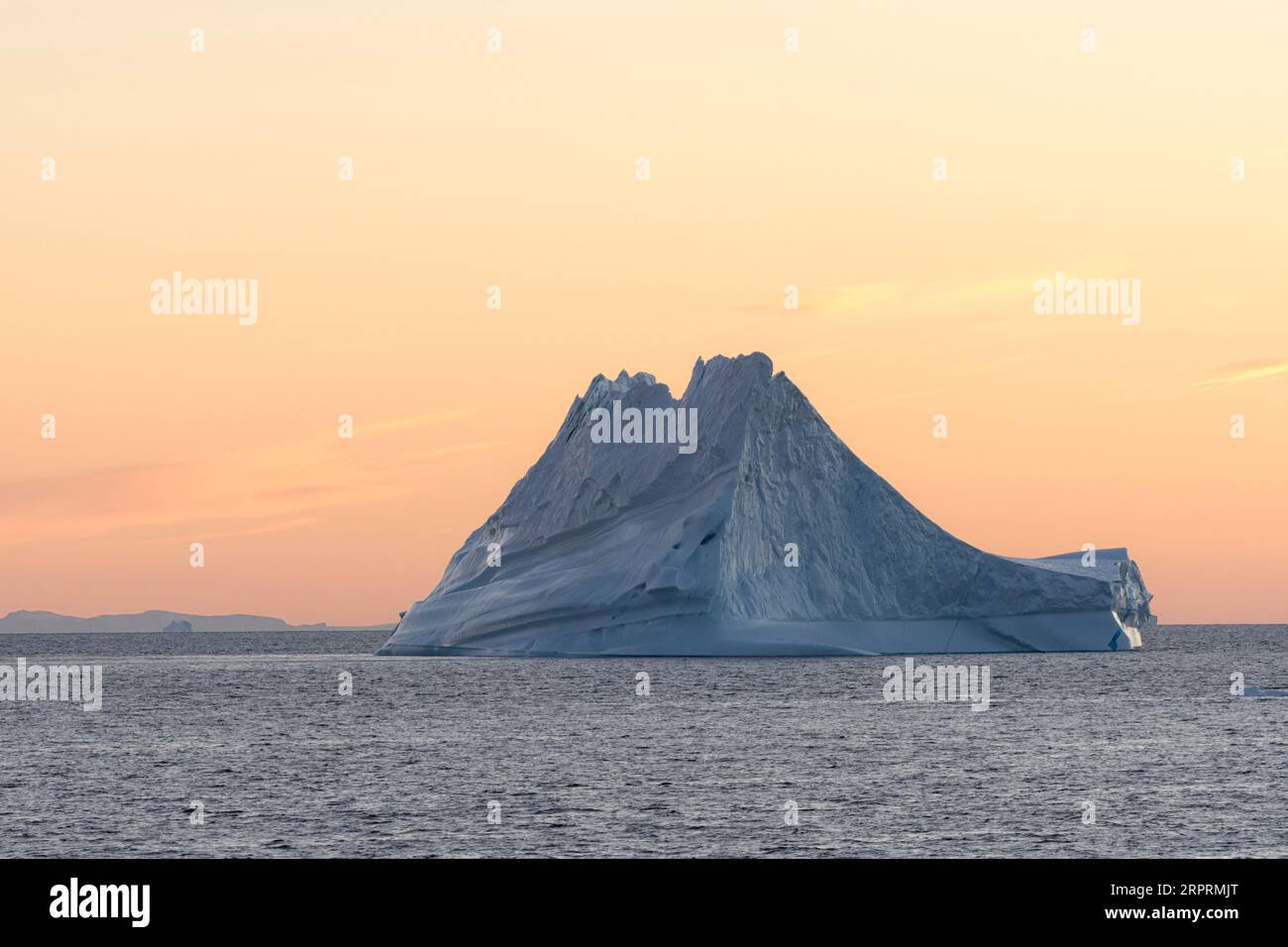 Impressive floating pinacle iceberg in Disko Bay in the arctic early ...