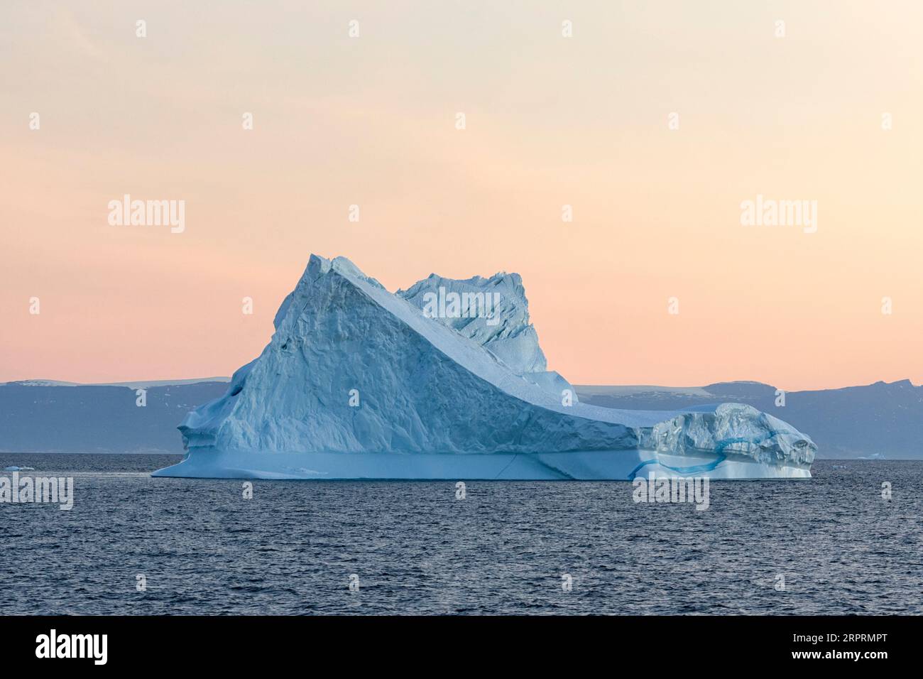 Impressive floating pinacle iceberg in Disko Bay in the arctic early ...