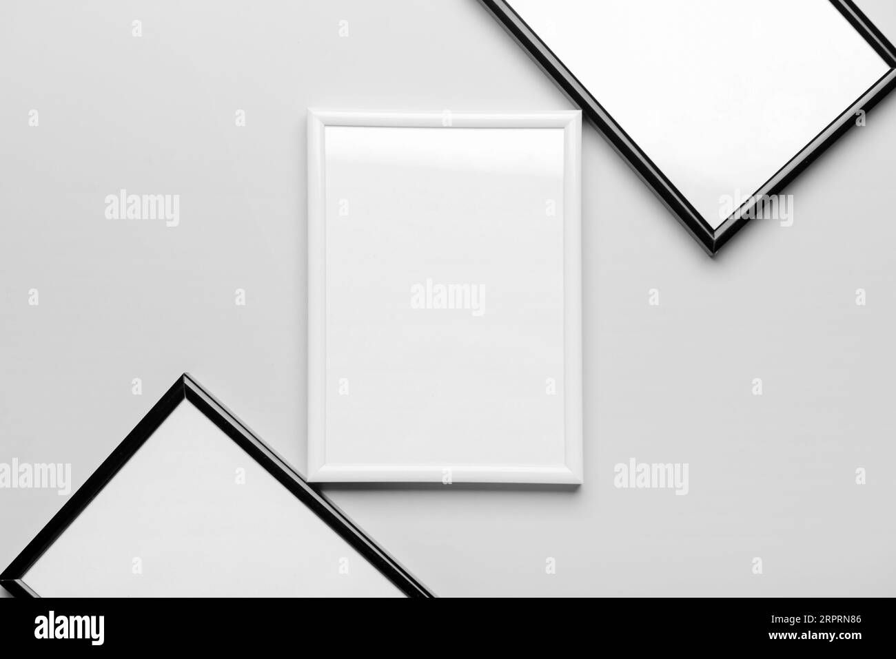Blank picture frames on light background Stock Photo - Alamy