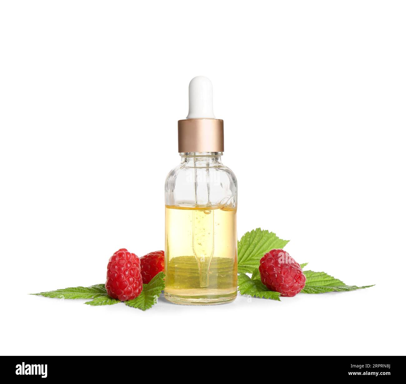 Bottle of cosmetic raspberry oil on white background Stock Photo - Alamy