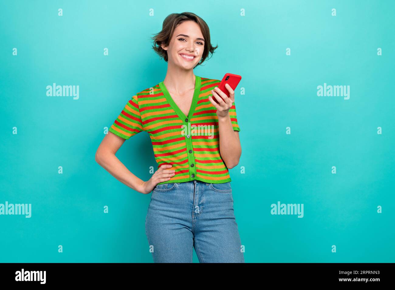 Photo of cute pretty woman dressed striped t-shirt chatting instagram ...