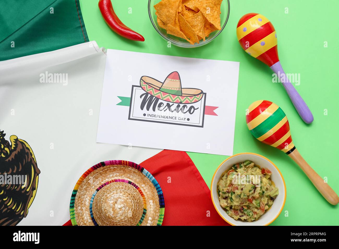 Greeting card with text MEXICO INDEPENDENCE DAY, maracas, Mexican flag ...