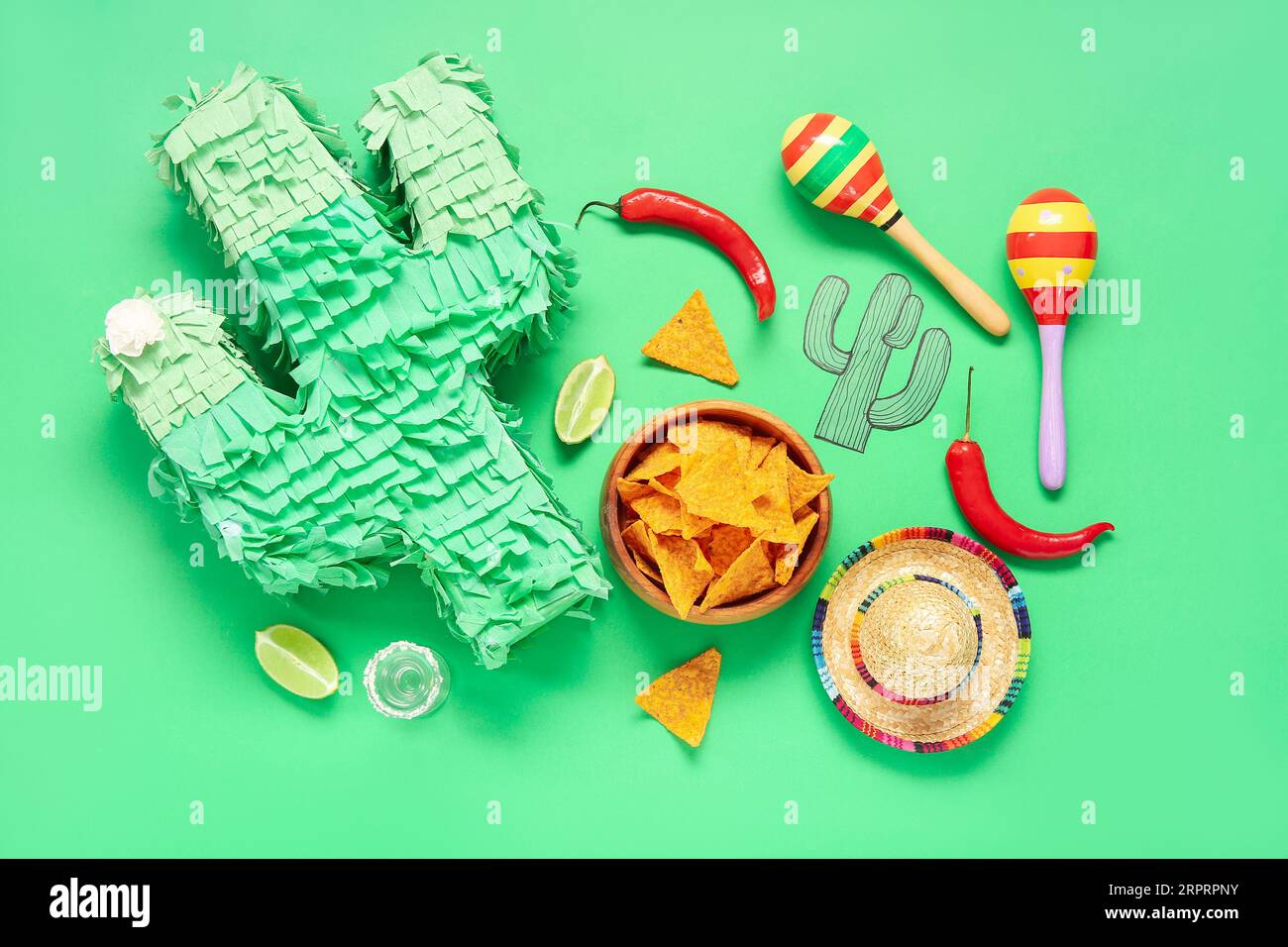 Composition with Mexican symbols and food for Independence Day on green ...