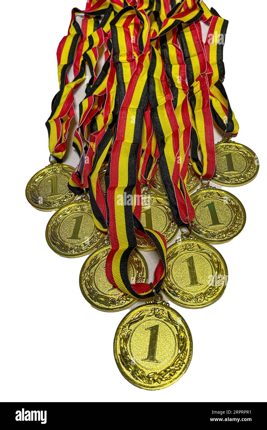 A captivating photo features a bunch of golden medals adorned with ...