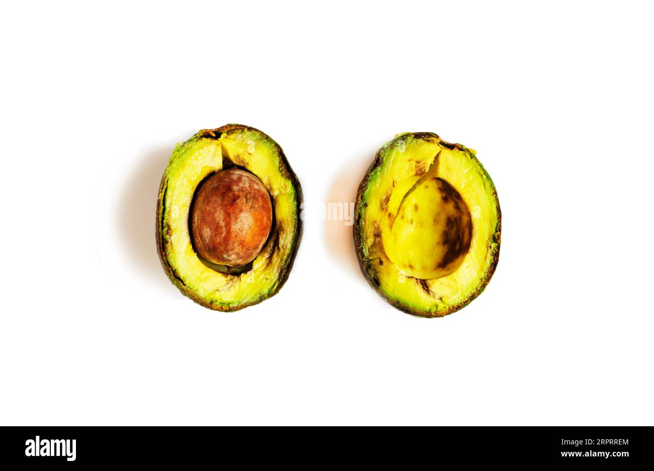 over-ripe, spoiled avocado on a white background Stock Photo - Alamy
