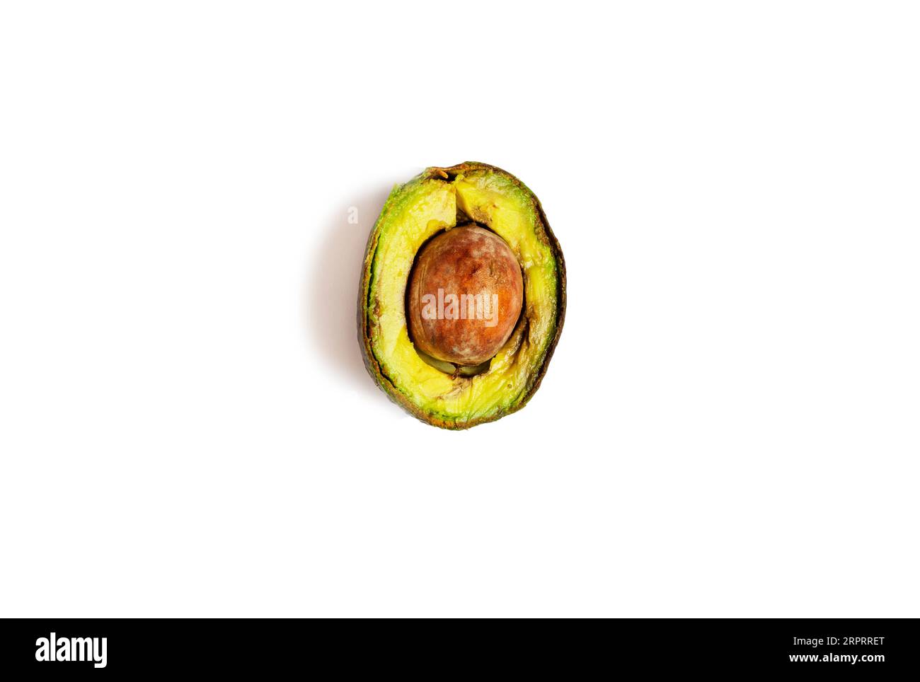 over-ripe, spoiled avocado on a white background Stock Photo - Alamy