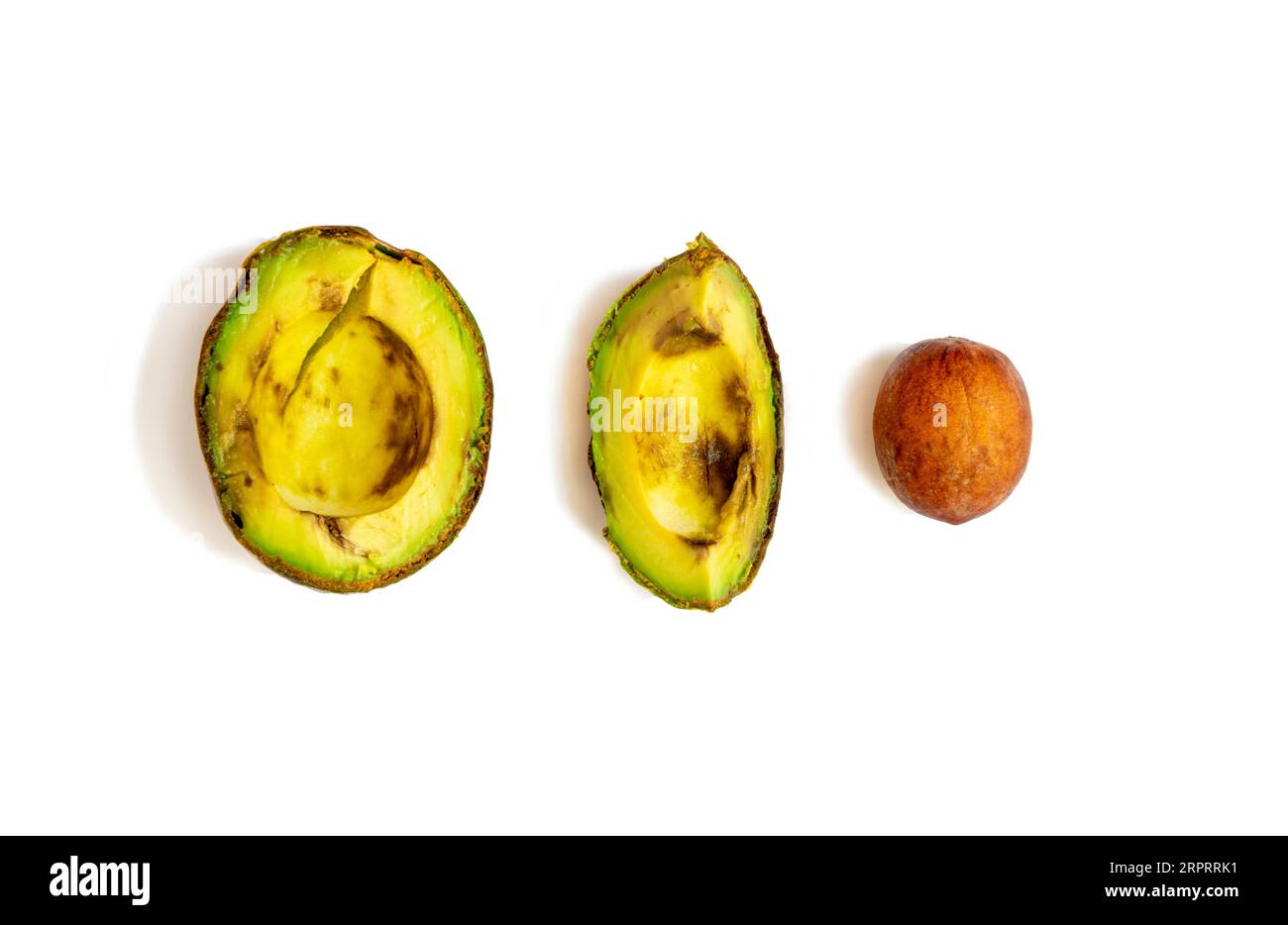 over-ripe, spoiled avocado on a white background Stock Photo - Alamy