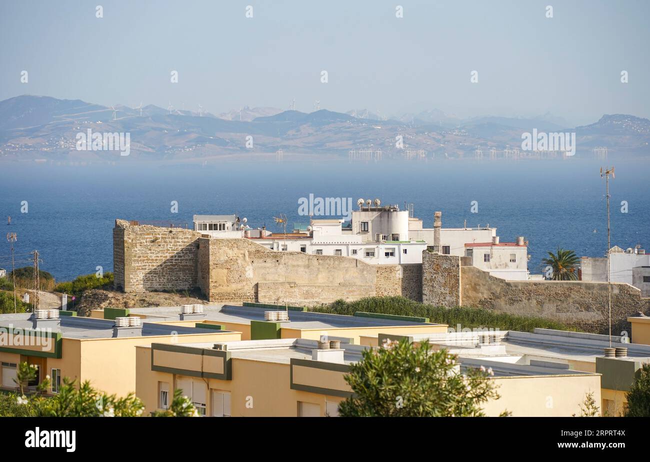 Tarifa town with mountains of Morocco behind, strait of Gibraltar ...