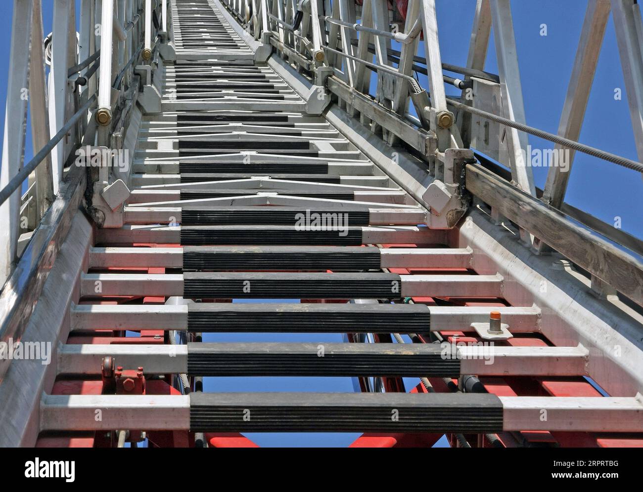 long metal ladder of the fire truck ladder during exercise Stock Photo ...