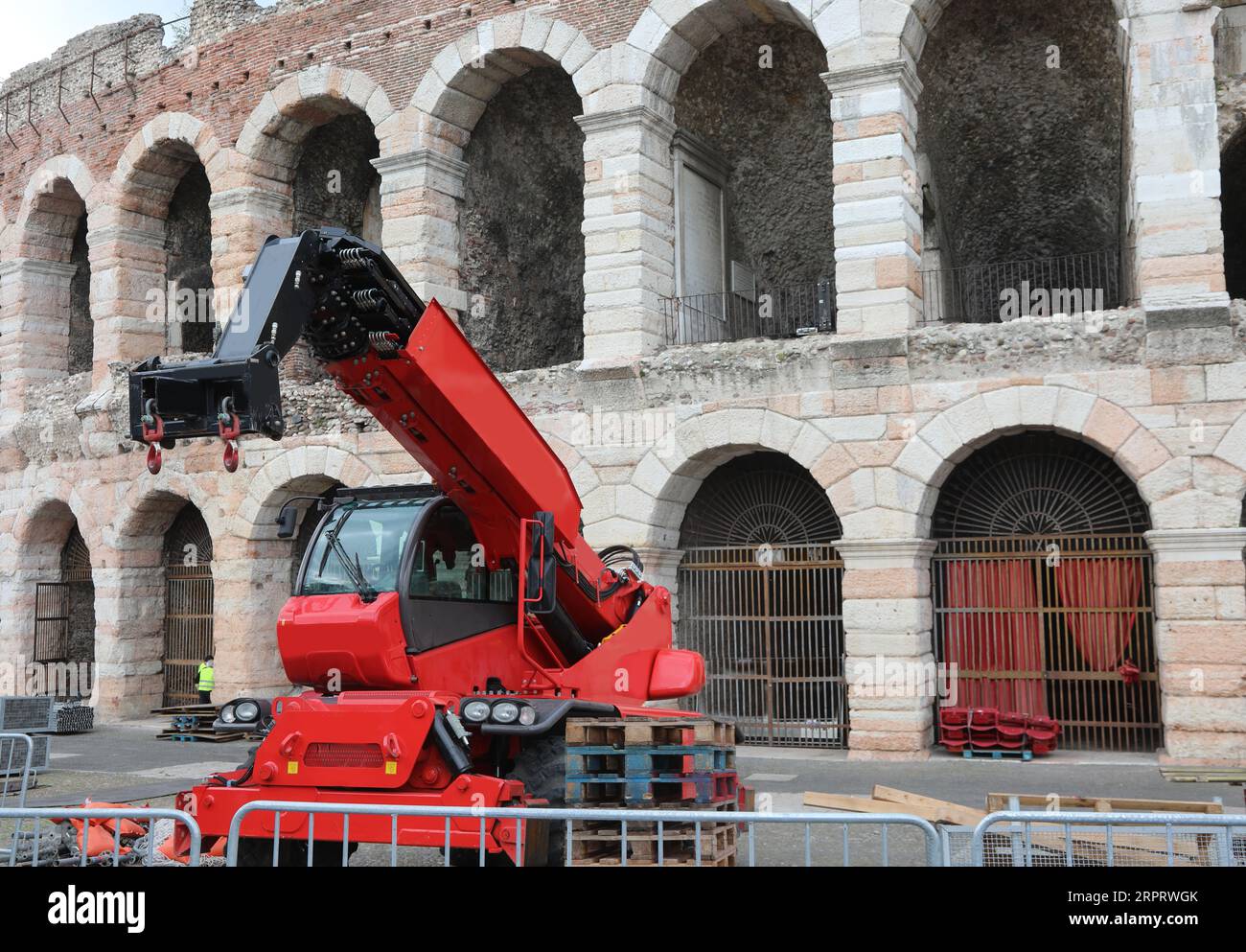 big powerful red crane for handling weight loads during the preparation ...