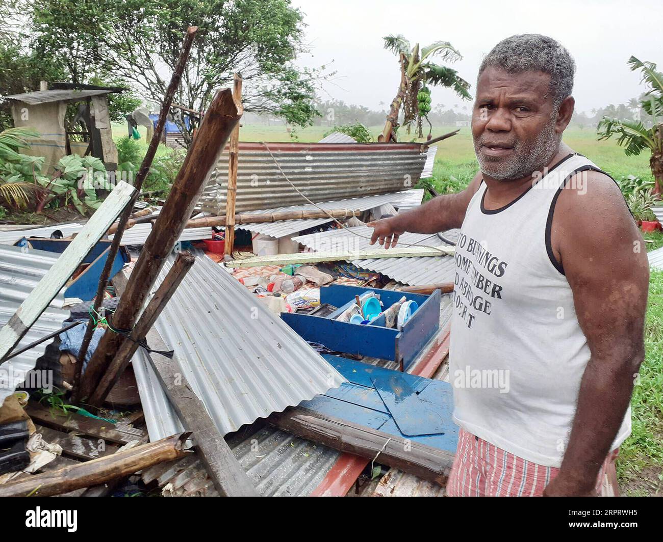 200408 -- SUVA, April 8, 2020 Xinhua -- A villager shows his damaged ...