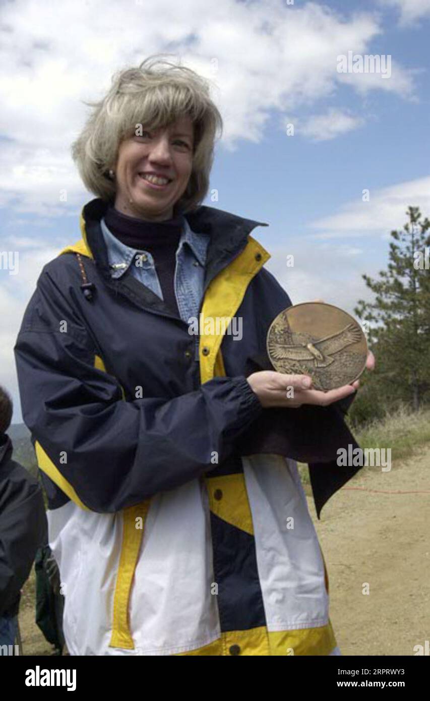 Secretary Gale Norton with commemorative coin, honoring the condor ...