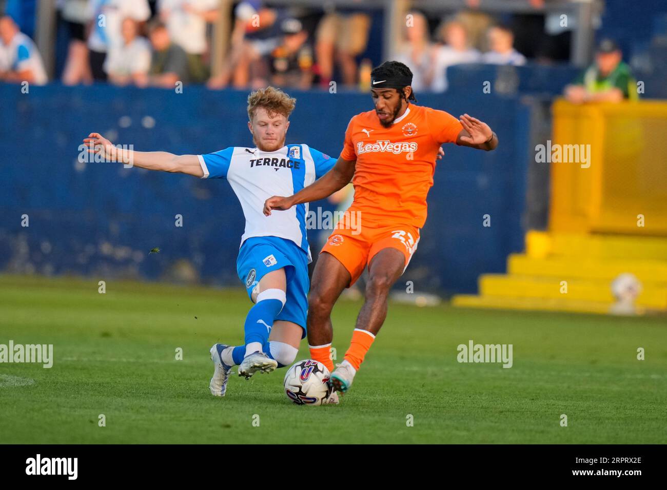 Luca Stephenson #18 of Barrow competes for the ball with Dominic ...