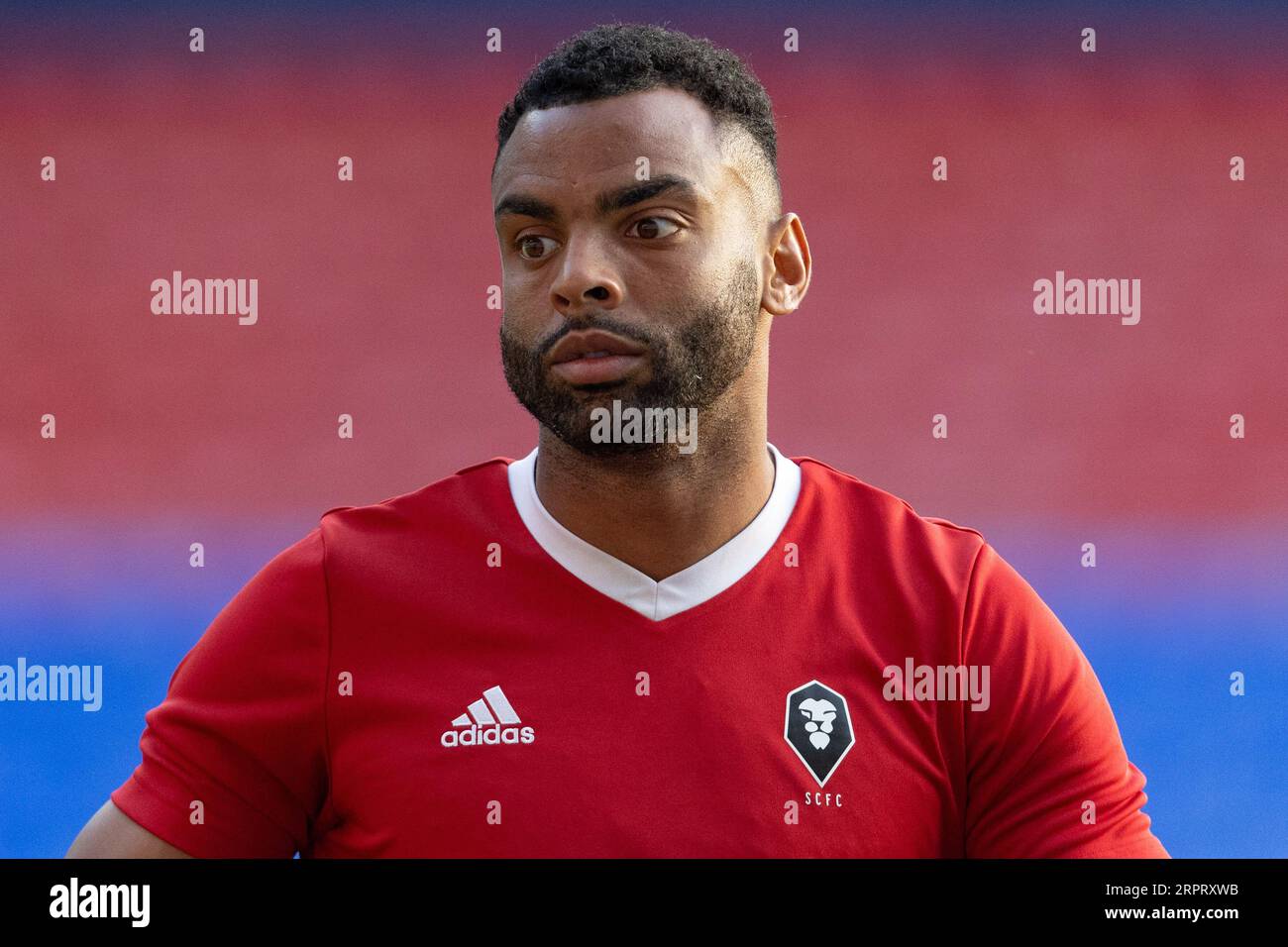 Bolton, UK, 5th September, 2023, Curtis Tilt of Salford City warms up ...