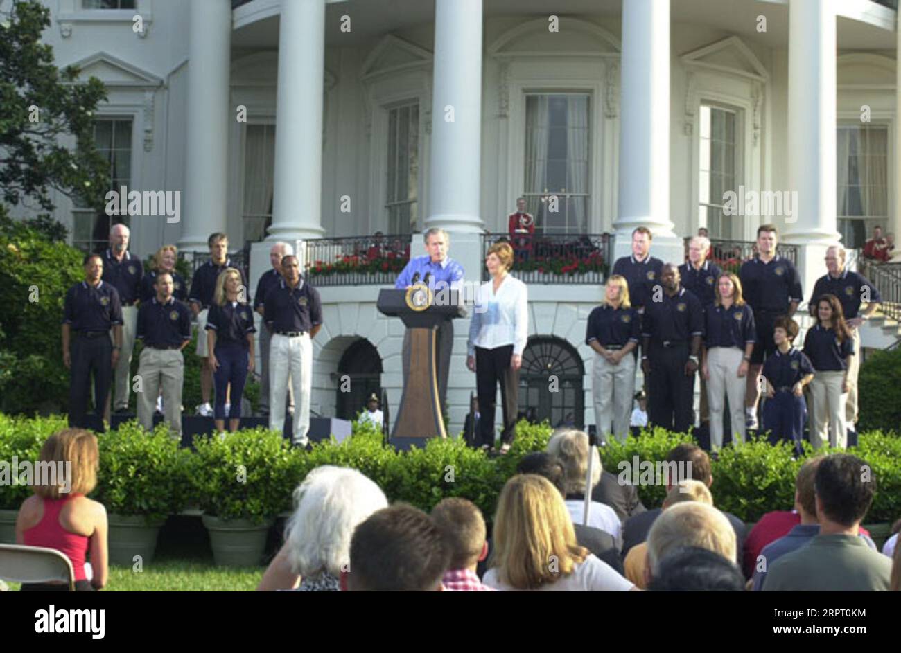 President George Bush, flanked by First Lady Laura Bush, disucssing the ...