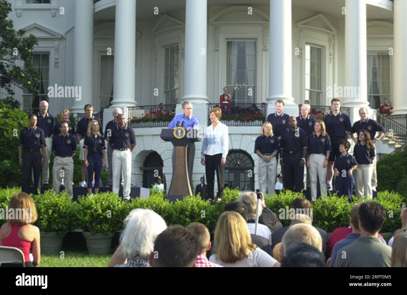 President George Bush, flanked by First Lady Laura Bush, disucssing the ...