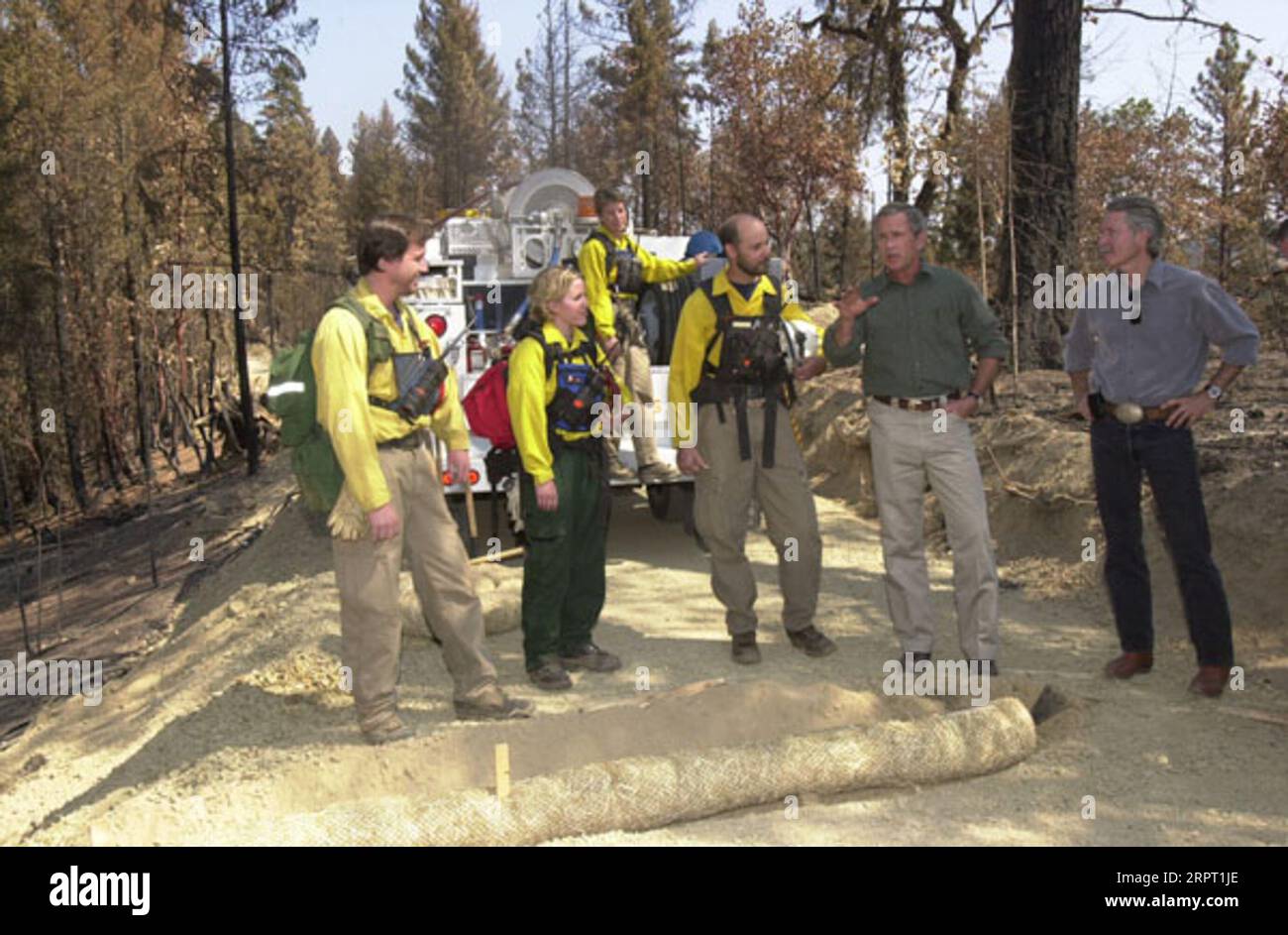 President George Bush visiting the site of the Squire Peak forest fire ...