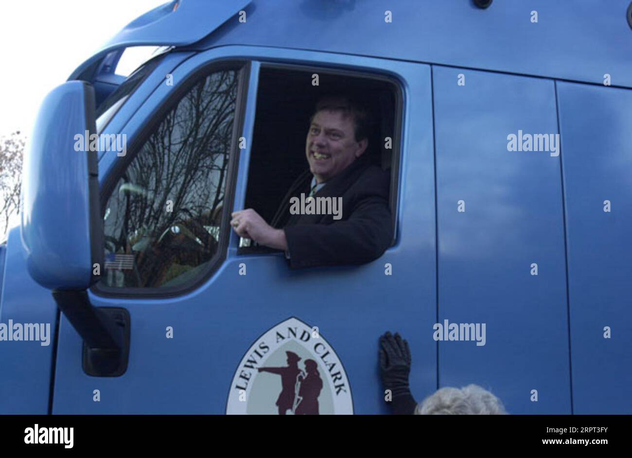 John Hughes, husband of Secretary Gale Norton, at the front of the ...
