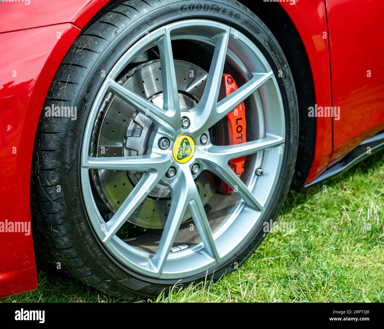 Close up image of an alloy wheel and tyre on a Lotus Evora sports car ...