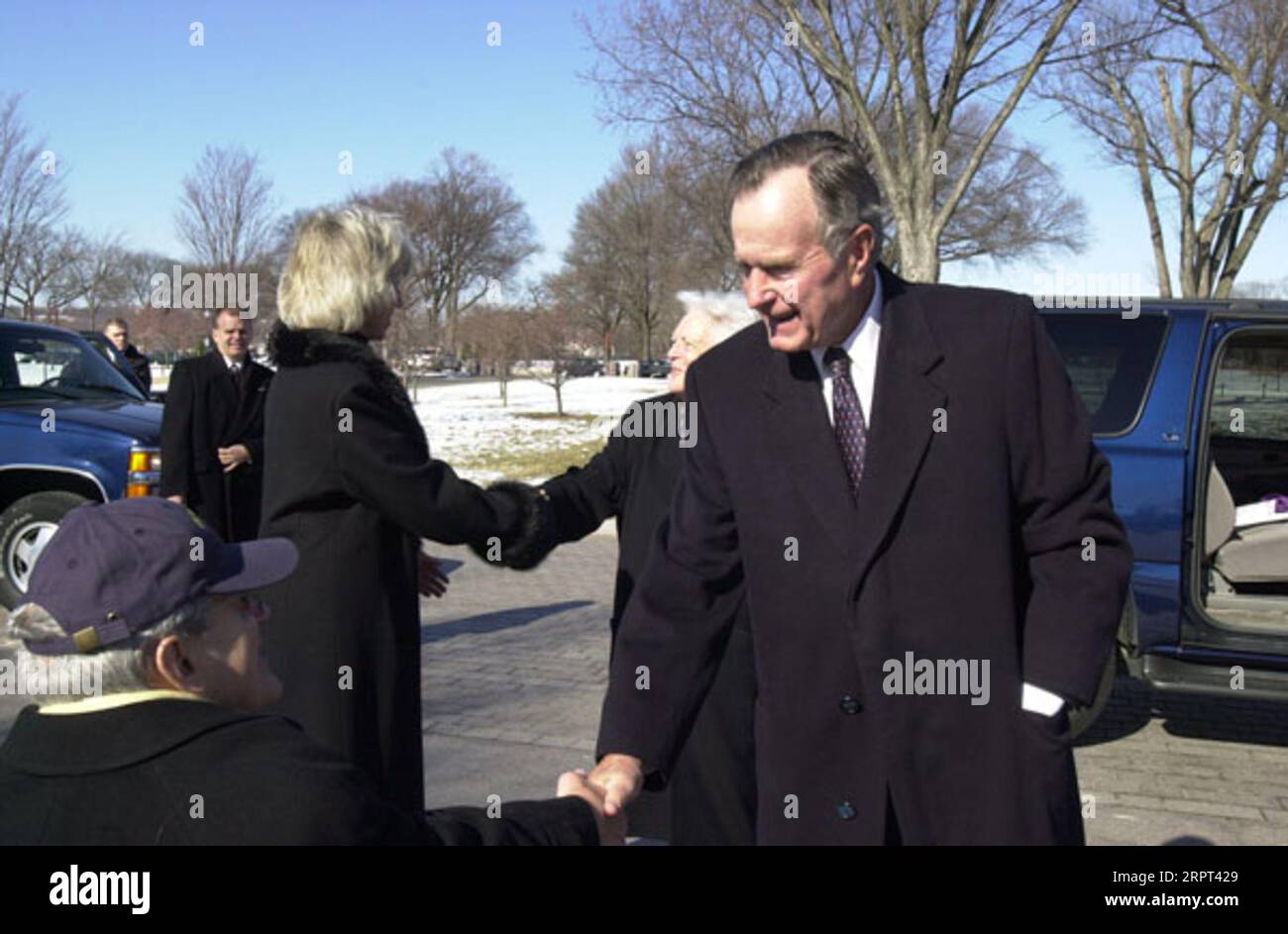 National Organization on Disability Chairman Michael Deland, front left ...