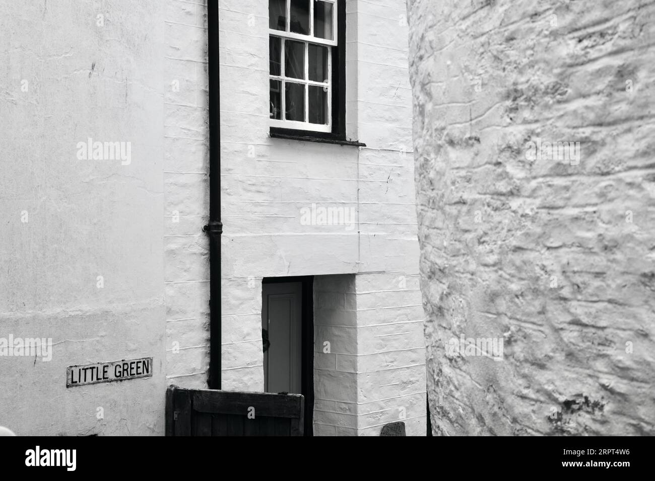 Whitewashed walls and narrow streets with steep inclines typify this ...