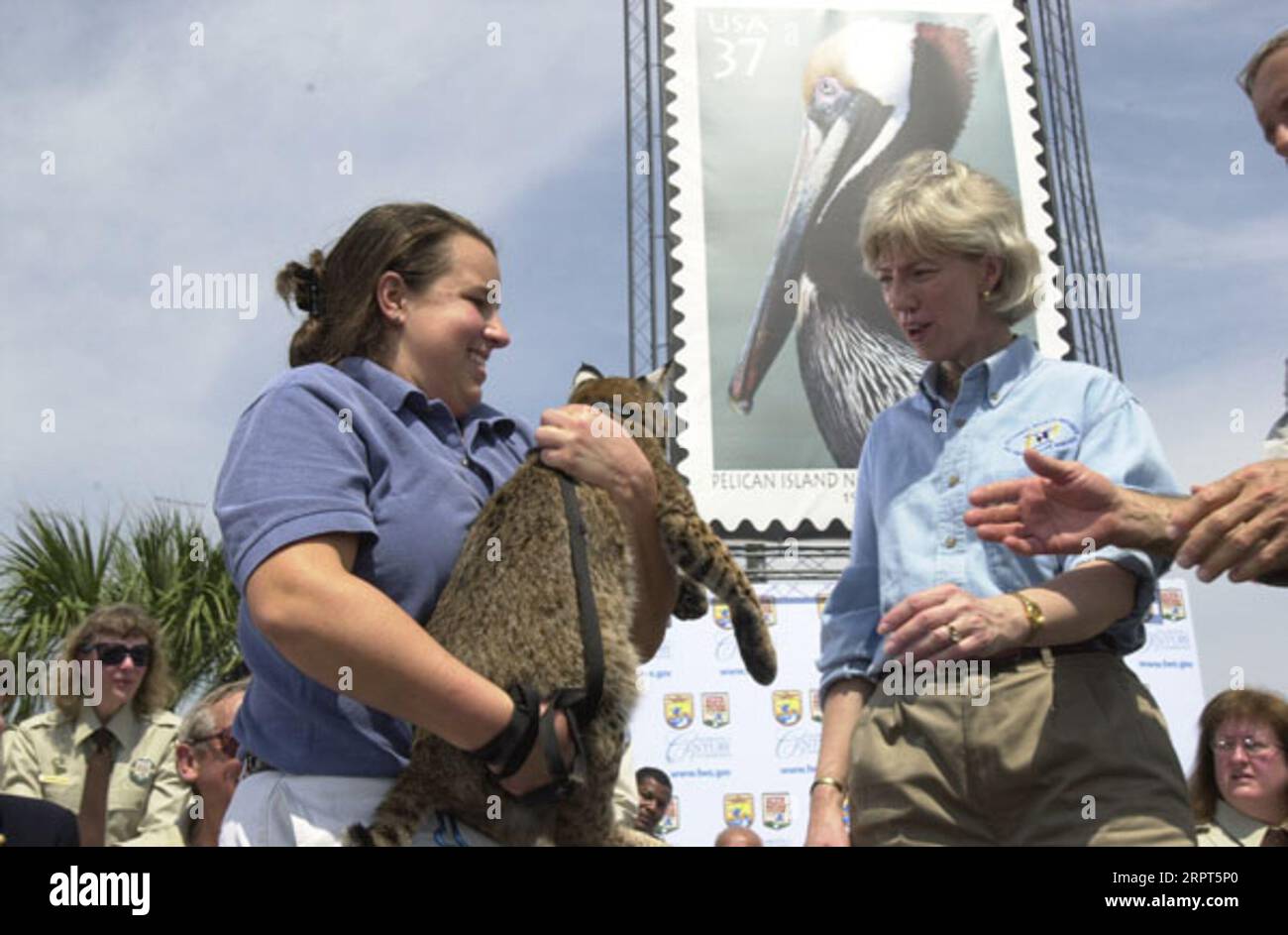 Secretary Gale Norton, right, admiring bobcat during wildlife display ...