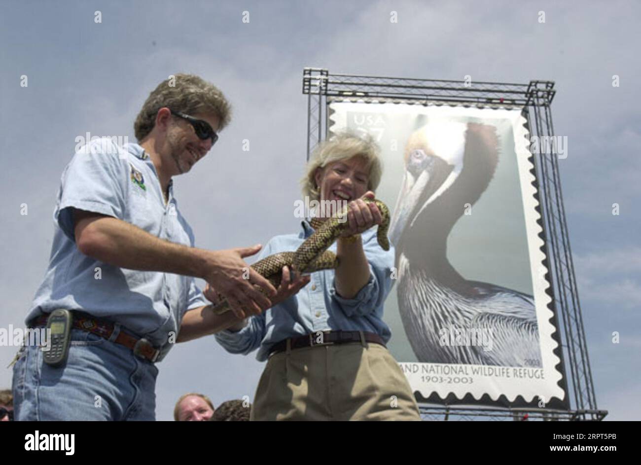 Secretary Gale Norton, right, with snake during wildlife display ...