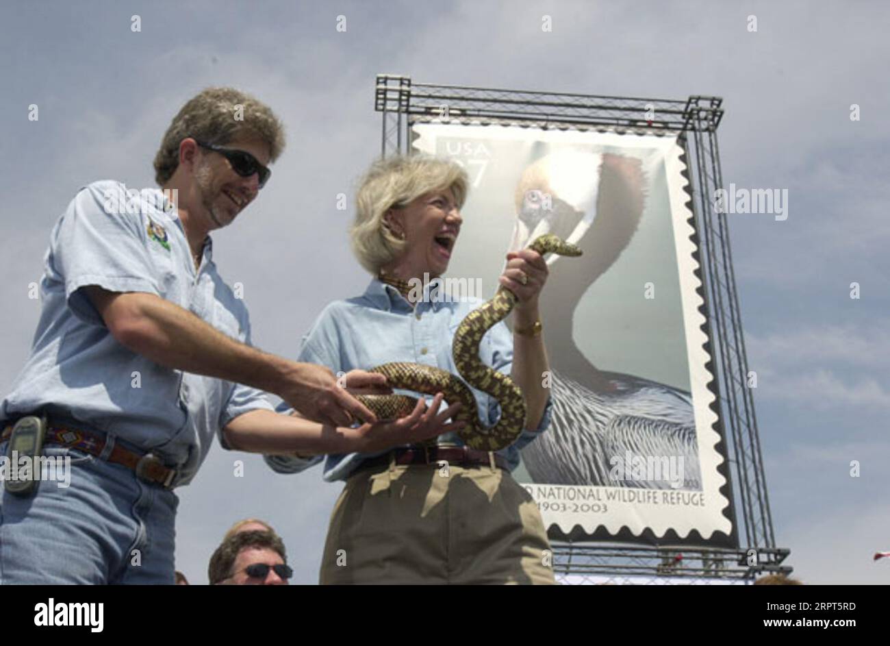 Secretary Gale Norton, right, with snake during wildlife display ...