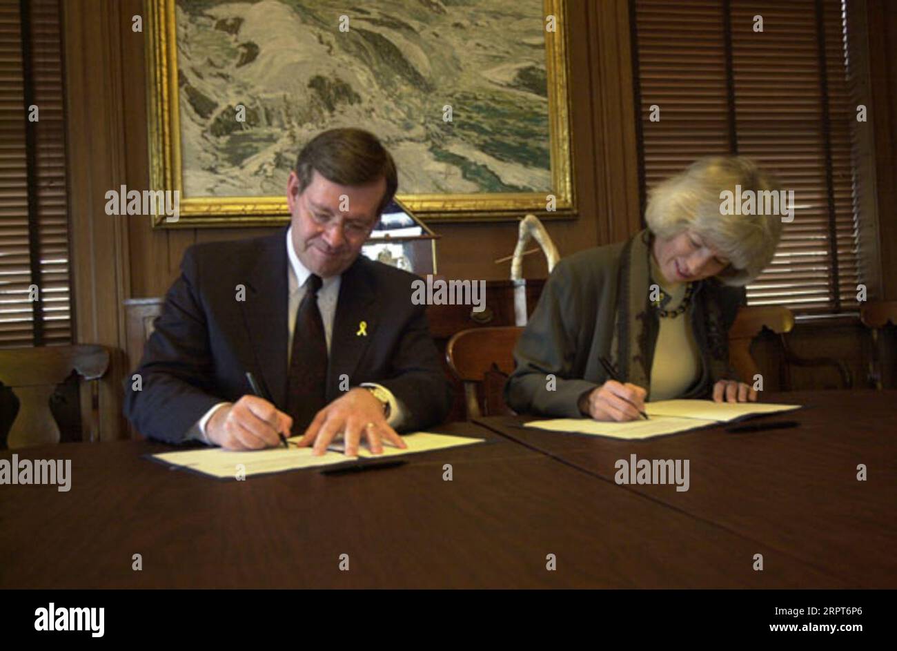 Utah Governor Mike Leavitt, left, and Secretary Gale Norton signing ...