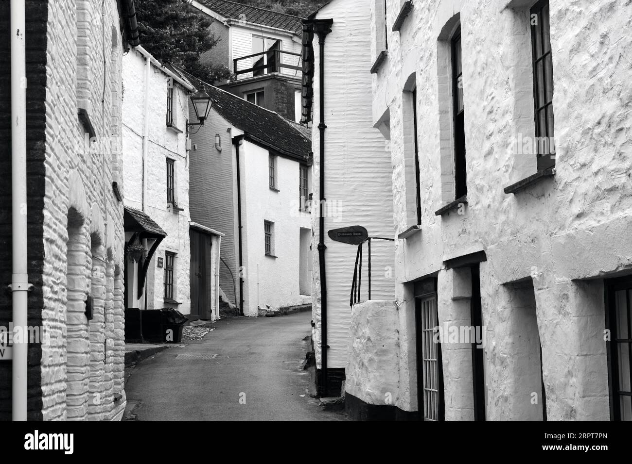 Whitewashed walls and narrow streets with steep inclines typify this ...