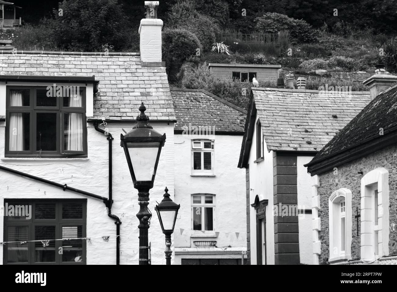 Whitewashed walls and narrow streets with steep inclines typify this ...