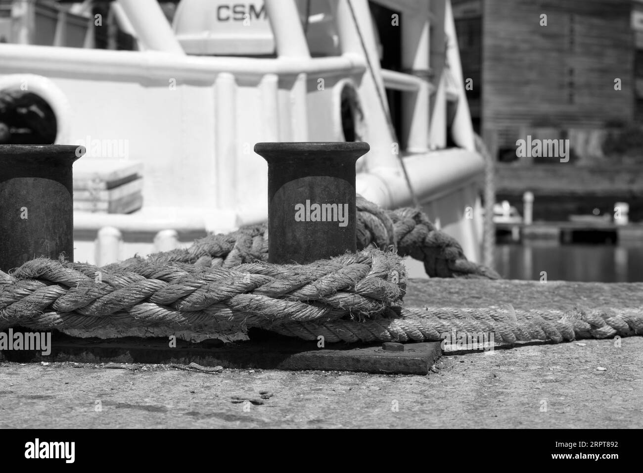 Large iron grappling hooks and thick ropes ropes on the boardwalks ...