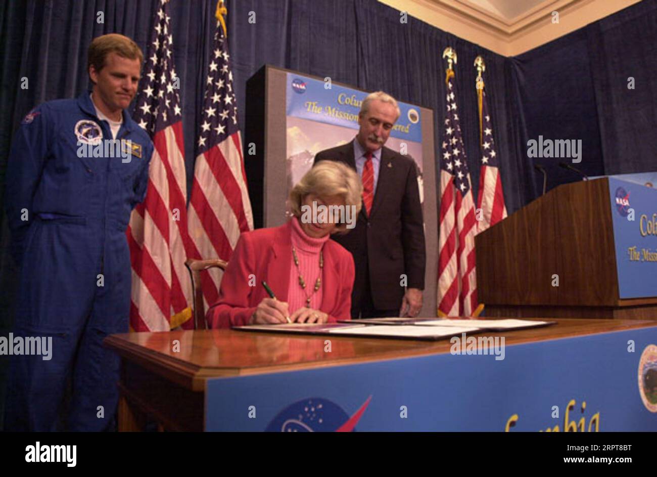 Secretary Gale Norton seated, with astronaut Scott Parazynski and ...