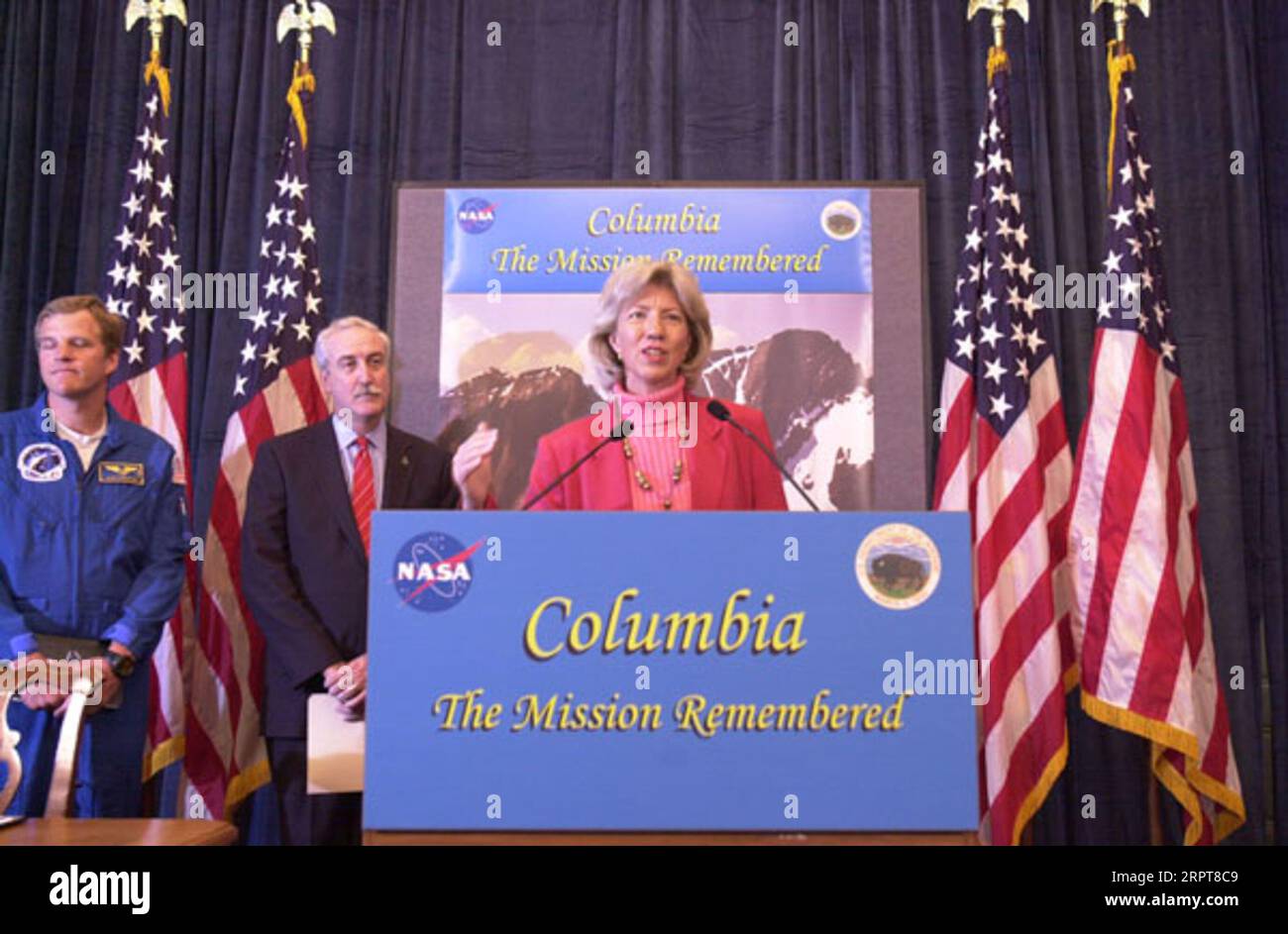 Secretary Gale Norton speaking, with astronaut Scott Parazynski and ...